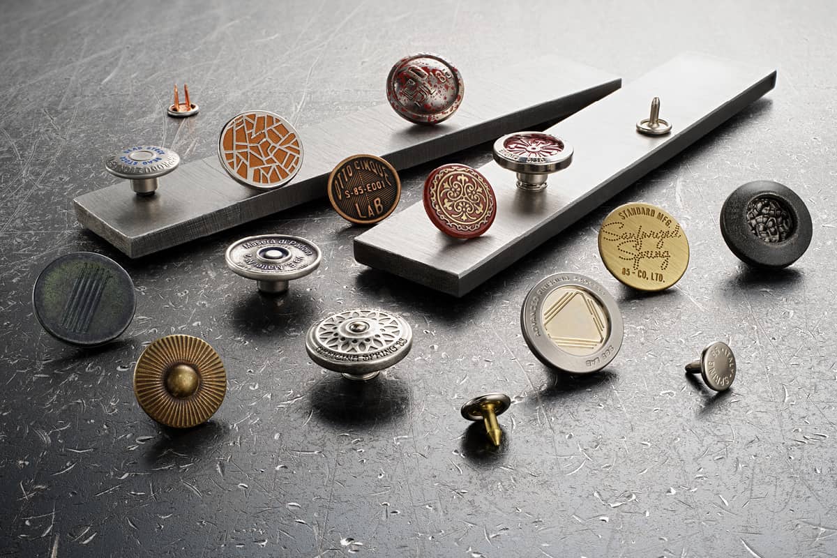 Stainless steel buttons for clothing and leather goods